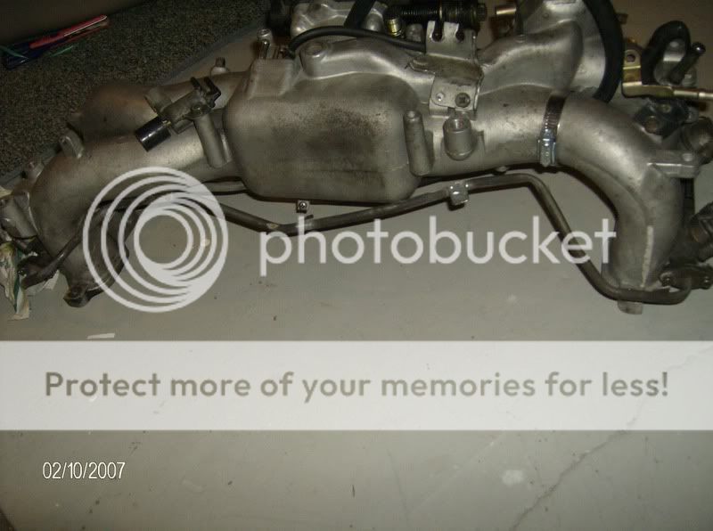 How To: STi Injectors into EJ18 Rails onto EJ20G manifold. - NASIOC